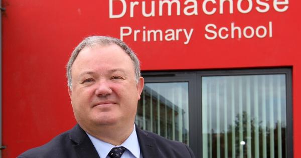 Top marks for principal - Photo 1 of 1 - Alpha Newspaper Group